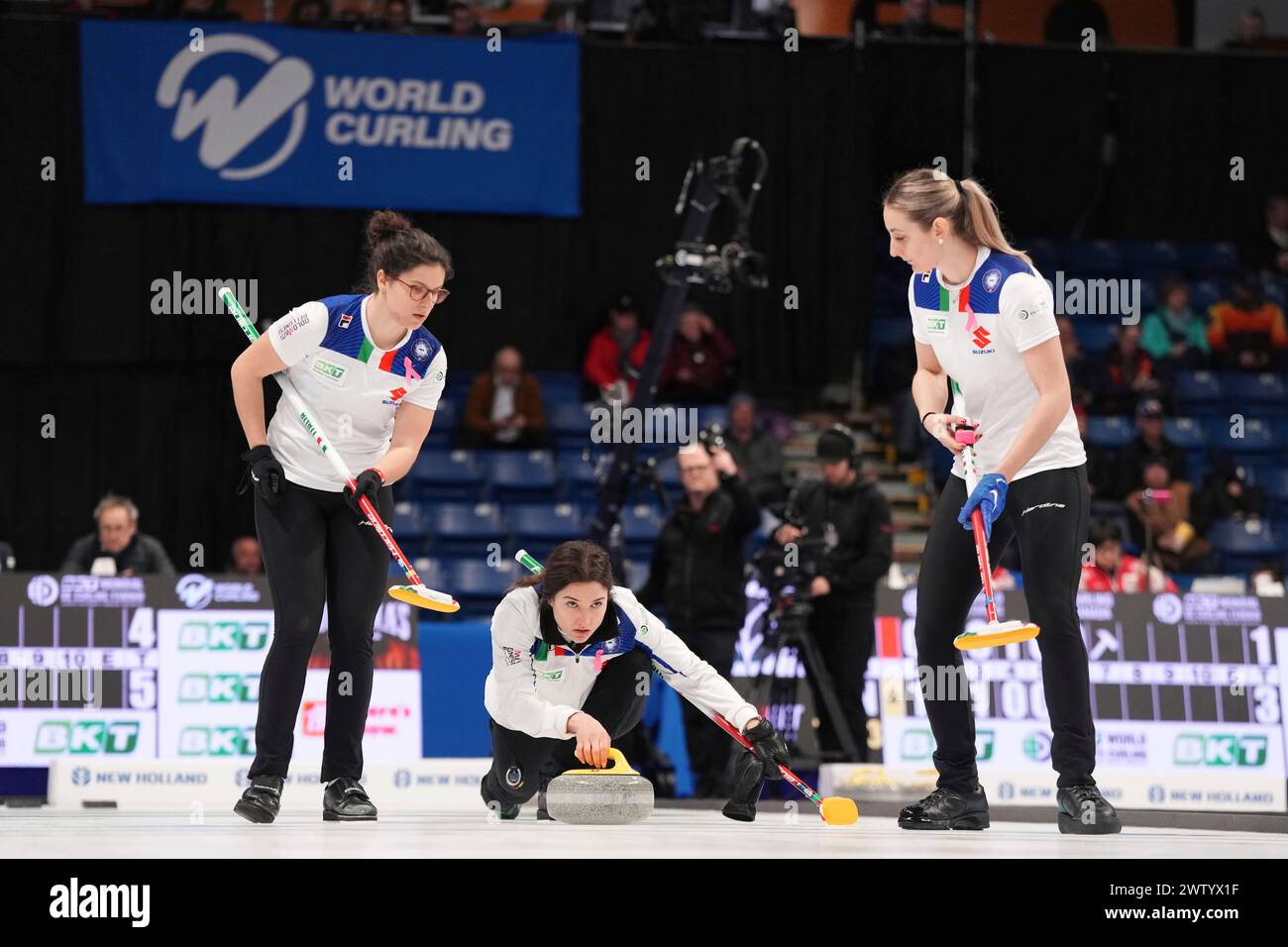 Italy's skip Stefania Constantini delivers a stone against South Korea ...