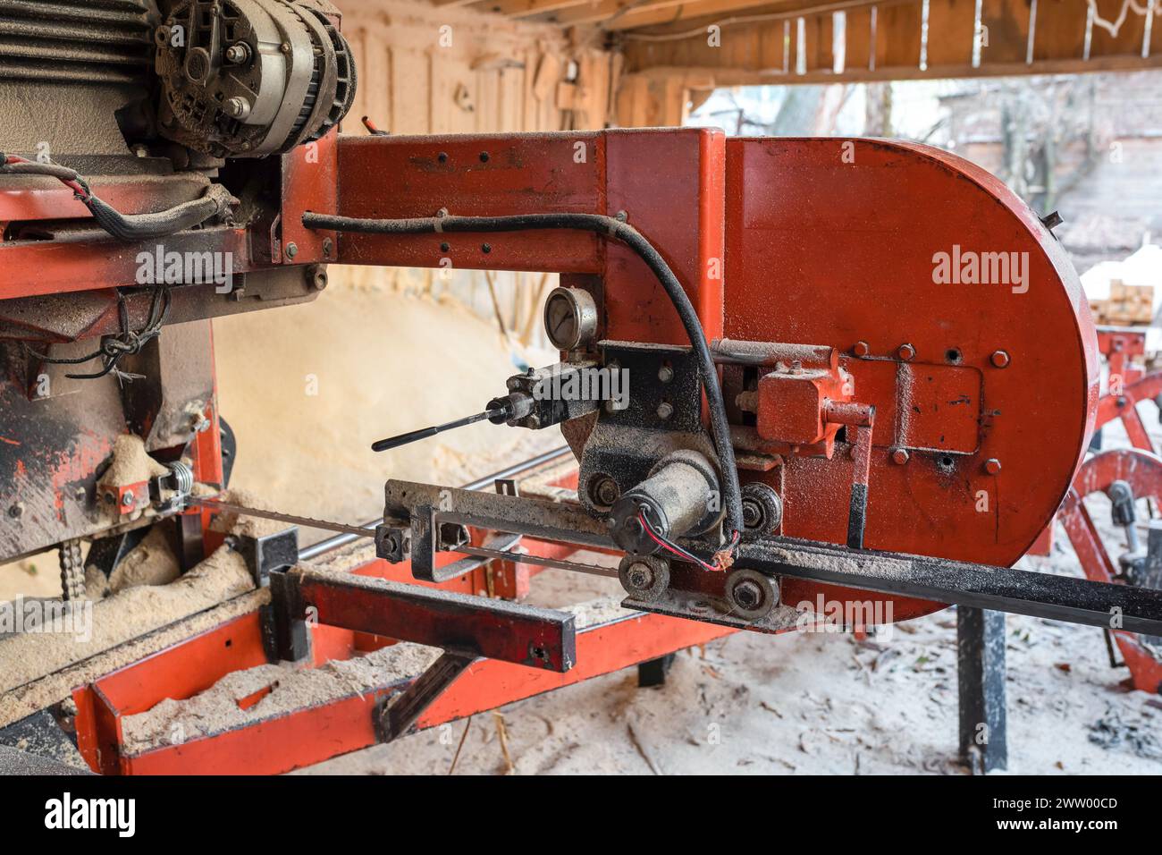 Industrial sawing of boards from logs on modern sawmill equipment Stock ...
