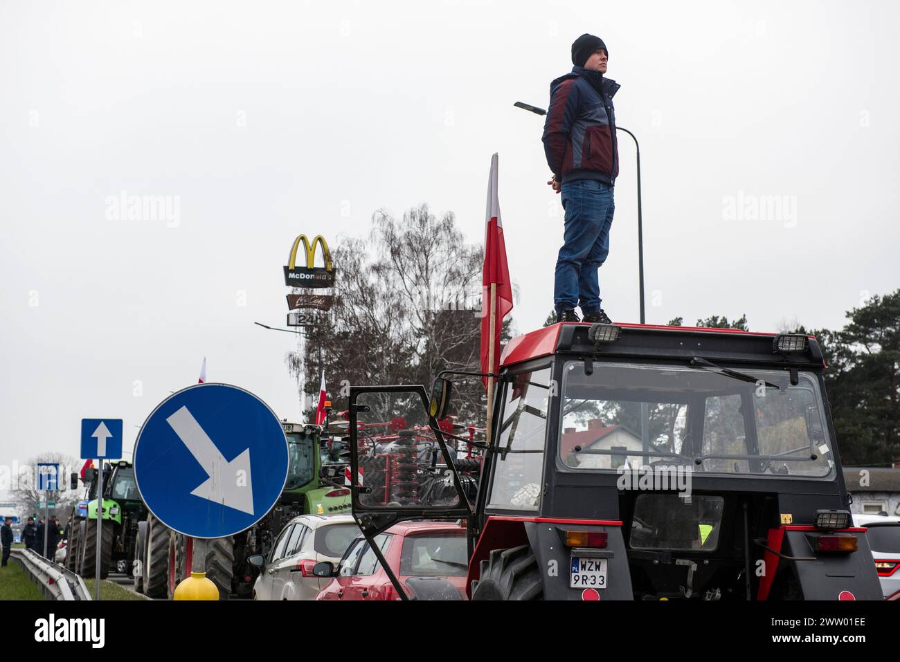 Protesting farmers are seen on the roof of their tractors during the ...