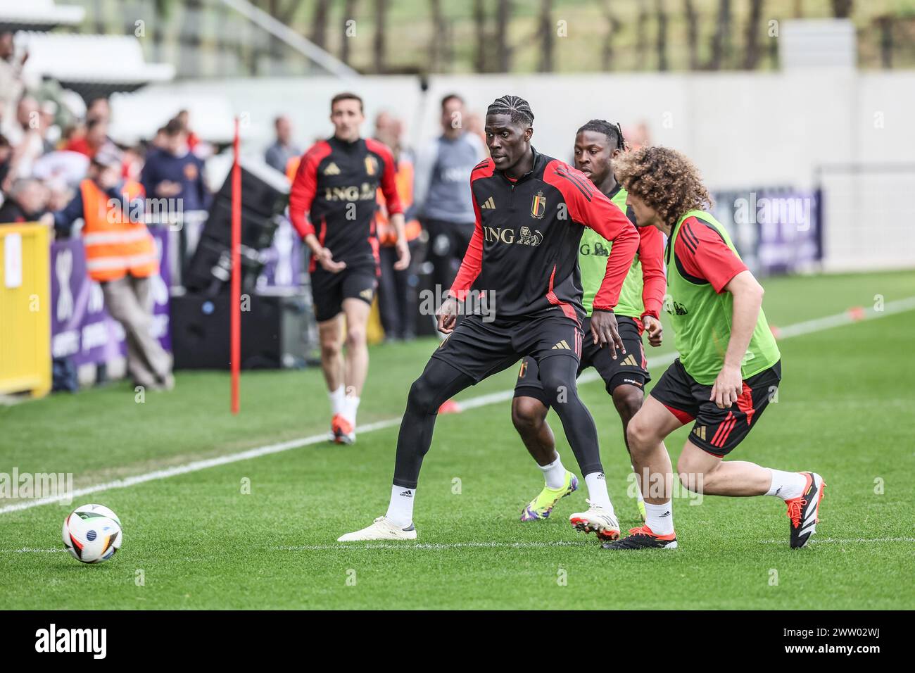 Tubize, Belgium. 20th Mar, 2024. Belgium's Amadou Onana and Belgium's ...