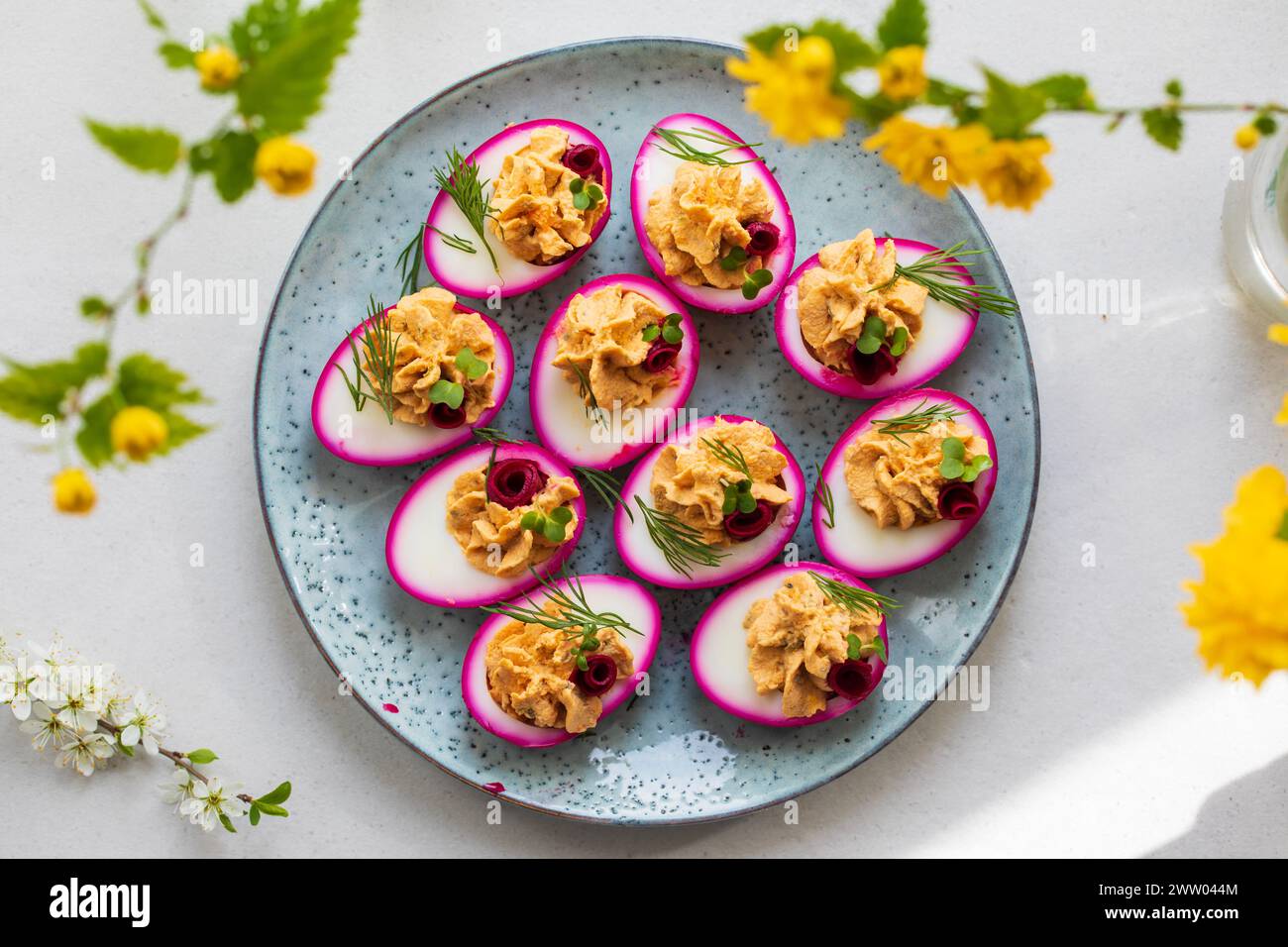 Beetroot pickled devilled eggs, easter canapes Stock Photo - Alamy