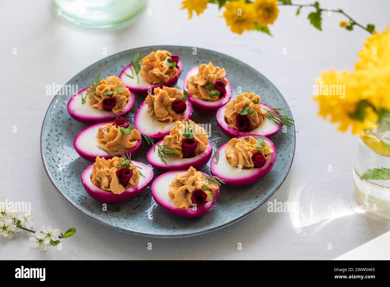 Beetroot pickled devilled eggs, easter canapes Stock Photo - Alamy