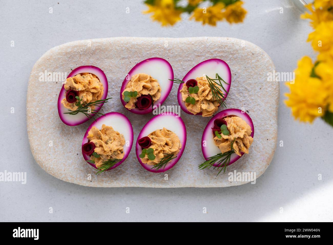Beetroot pickled devilled eggs, easter canapes Stock Photo - Alamy