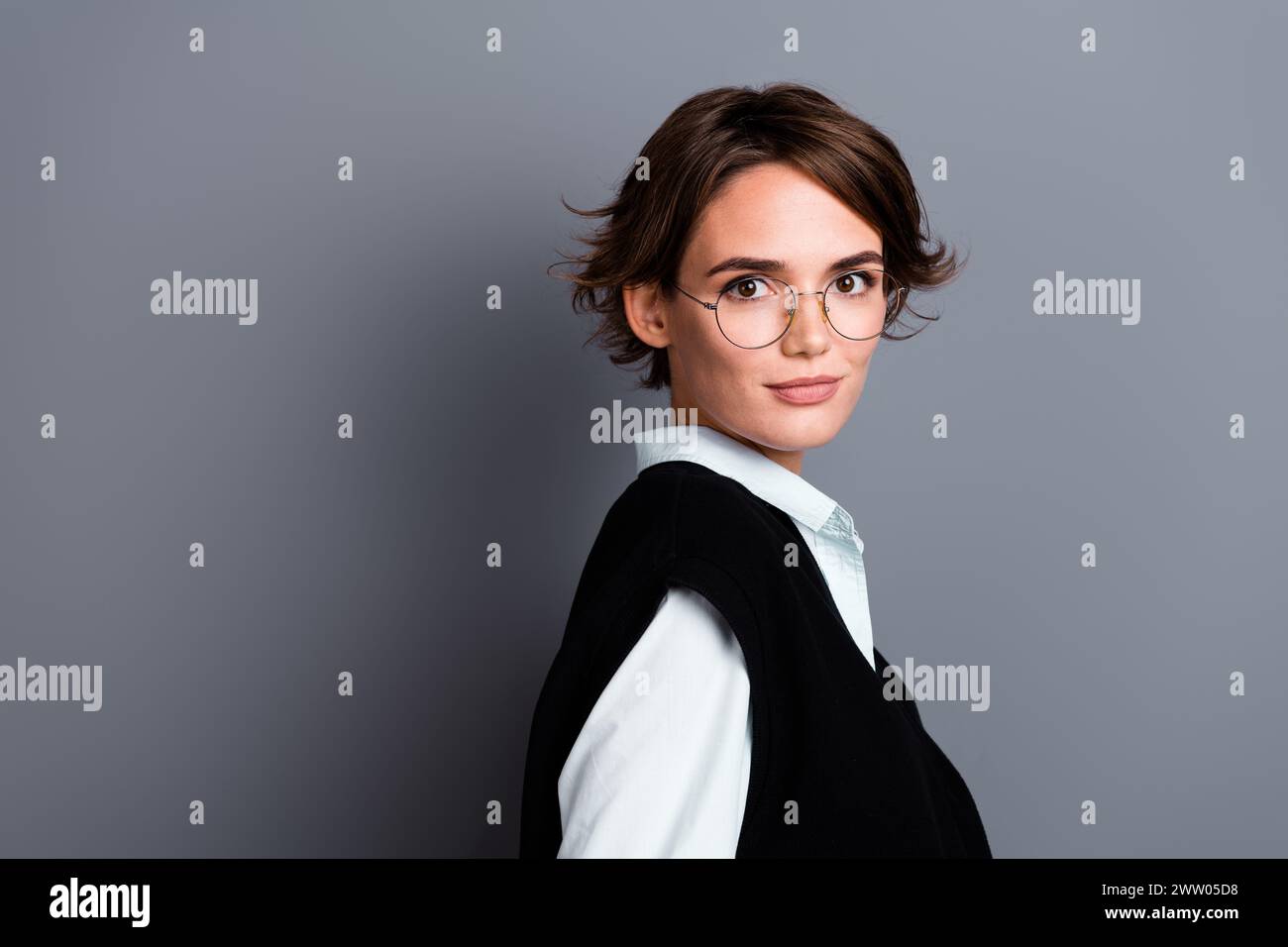 Side profile photo of clever woman in glasses wear waistcoat over shirt ...