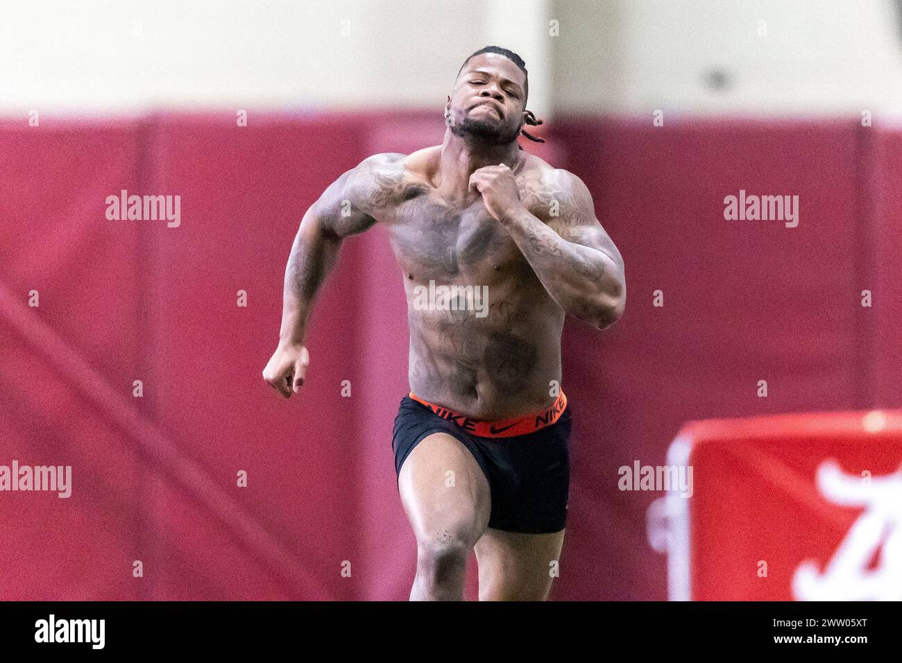 Former Alabama linebacker Trezmen Marshall runs his second 40-yard dash ...