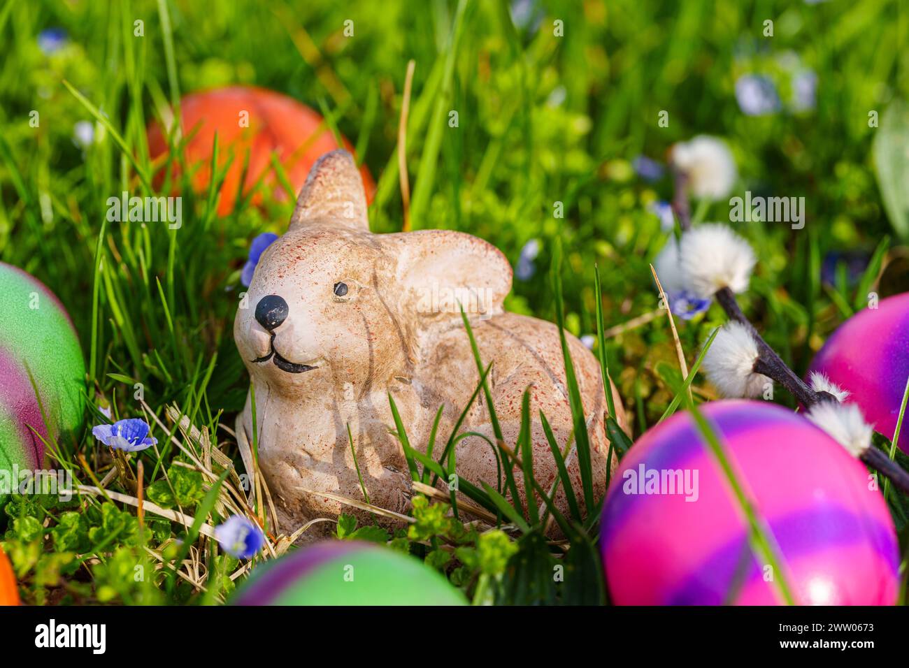 Augsburg, Bavaria, Germany - 19 March 2024: Easter bunny sits in green ...