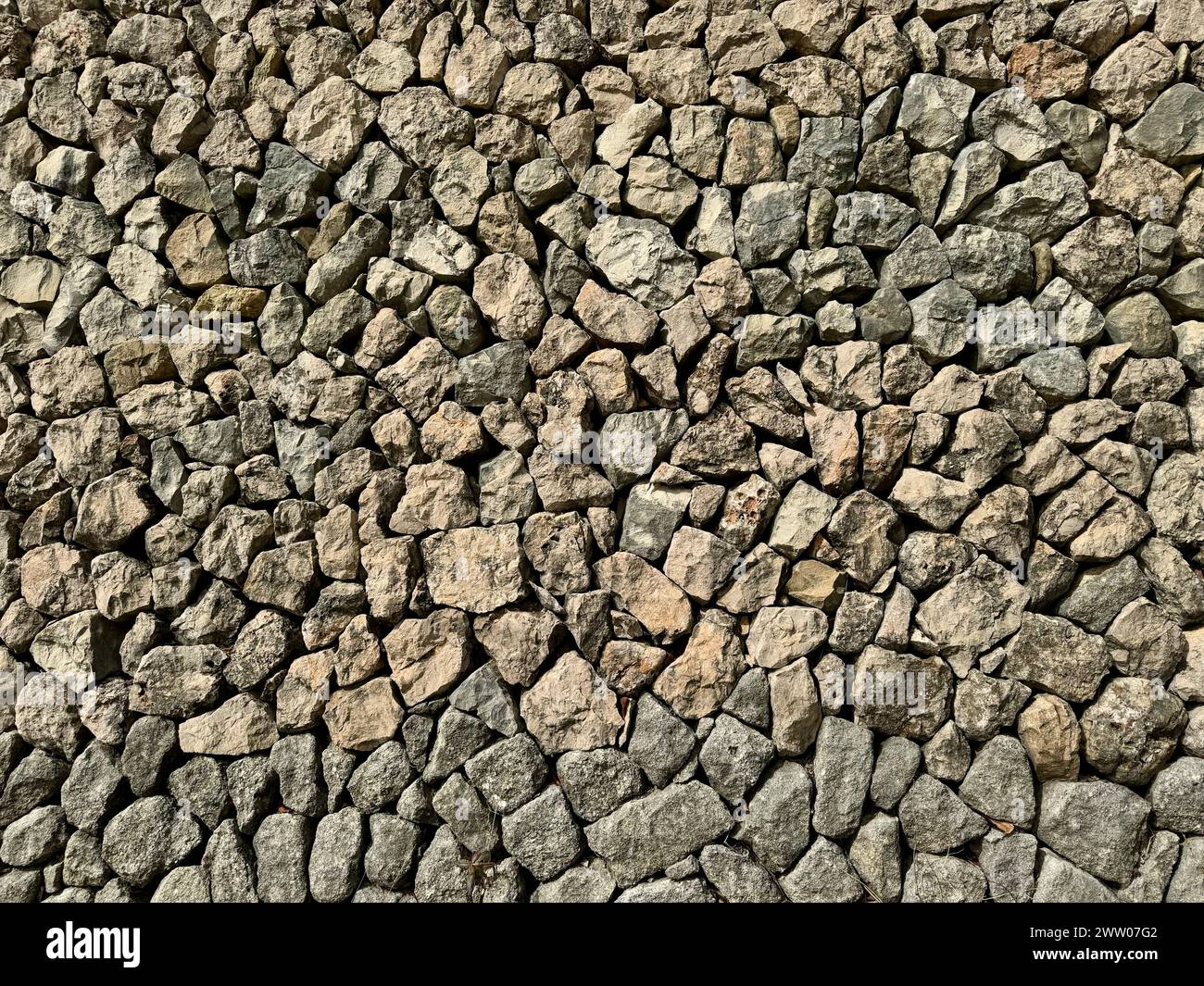 Texture of a rock wall built with the ancient dry stone technique. All ...