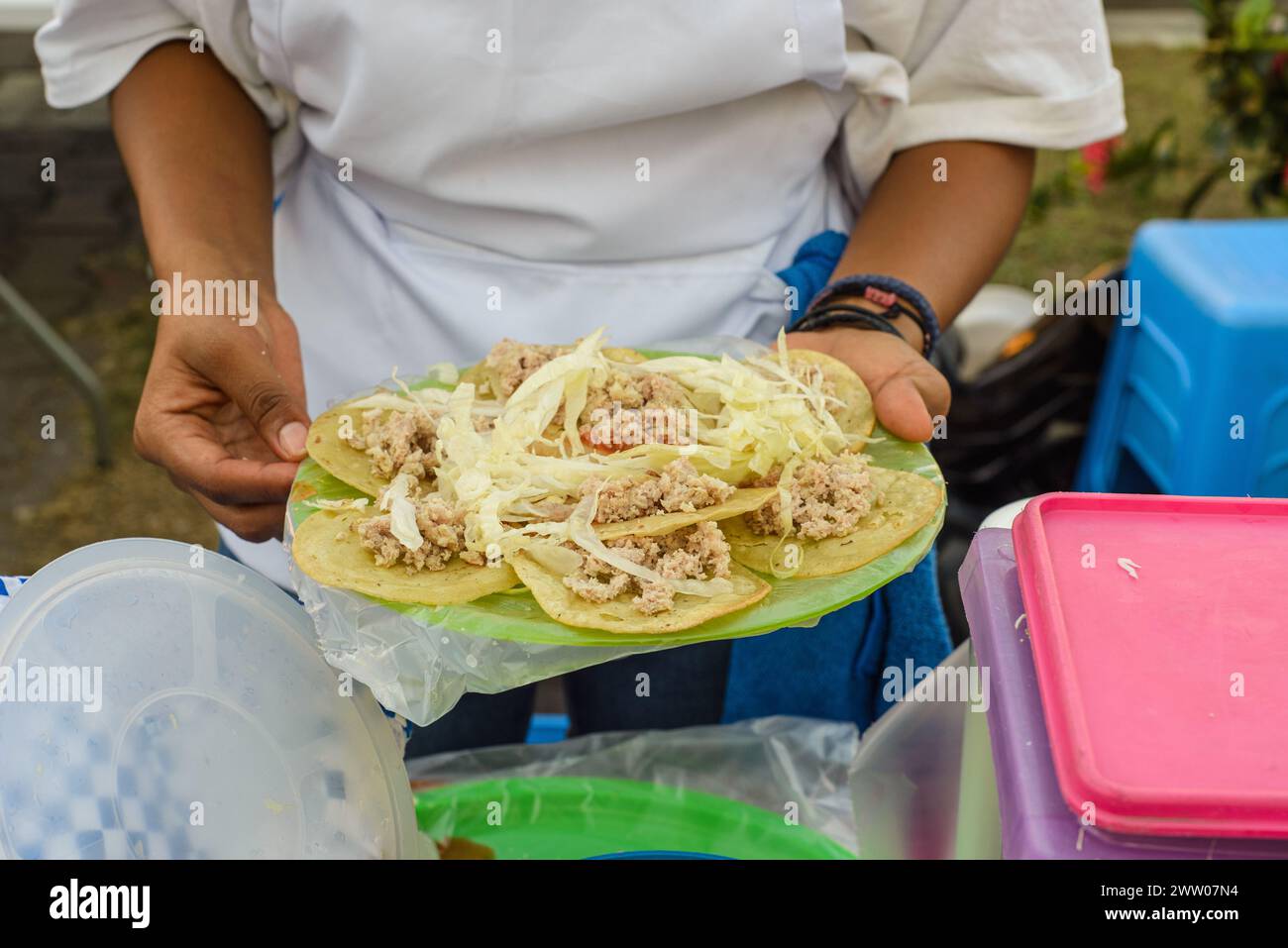 Order of sopitos at a street food stand. Typical food from Colima ...