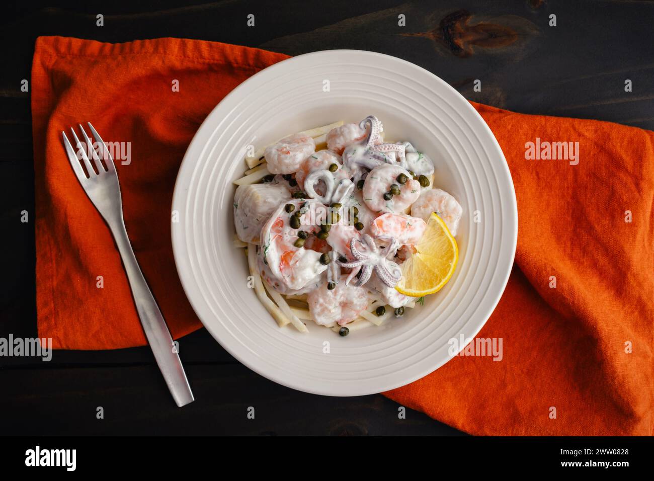 Poached Seafood Salad Served on Celery Root Remoulade: Bowl of shrimp ...