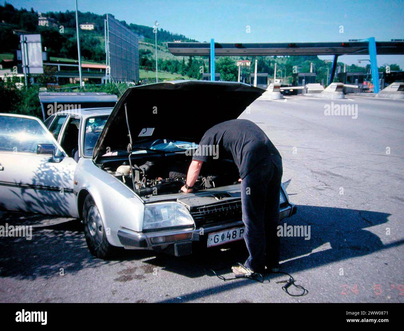car repair after a breakdown, fixing broken parts of an automobile car ...