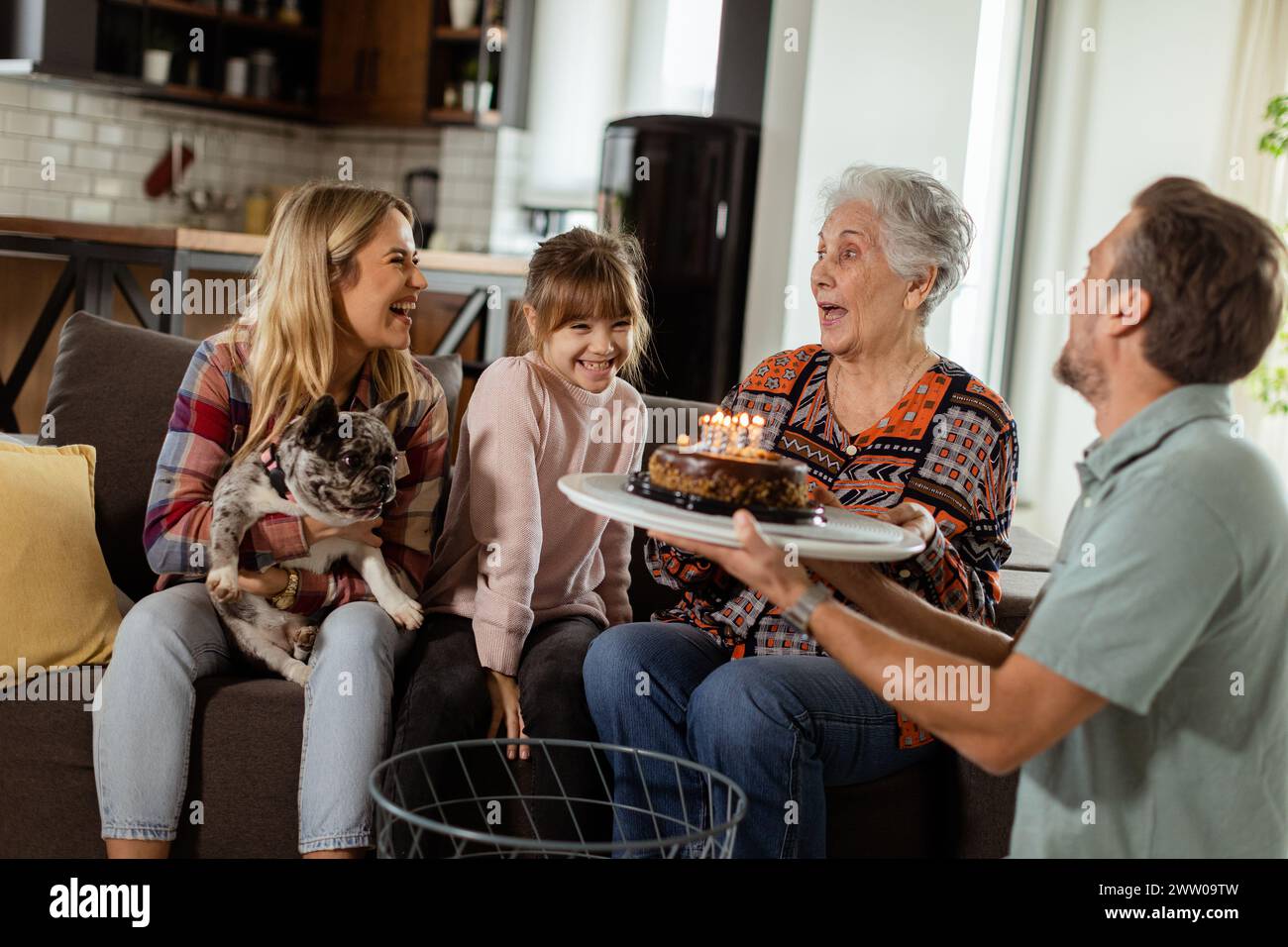 Heartwarming scene unfolds as a multi-generational family gathers on a ...