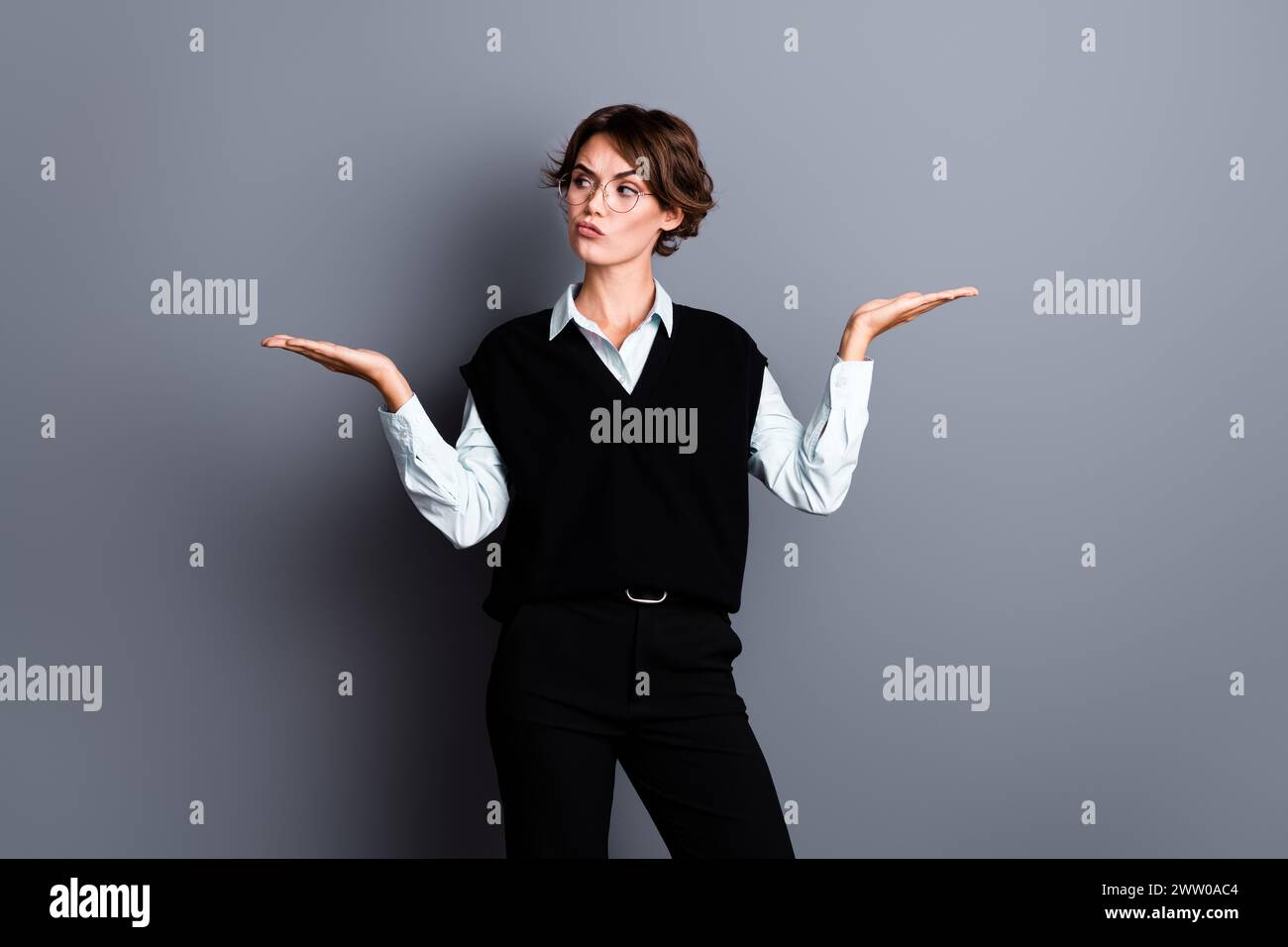 Photo of unsure uncertain lady sales manager dressed black vest eyewear ...