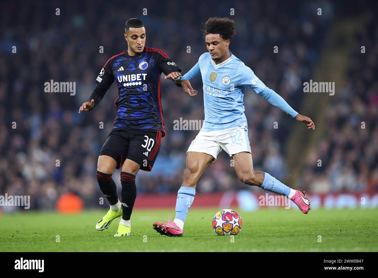 Oscar Bobb of Manchester City and Elias Achouri of FC Copenhagen during ...