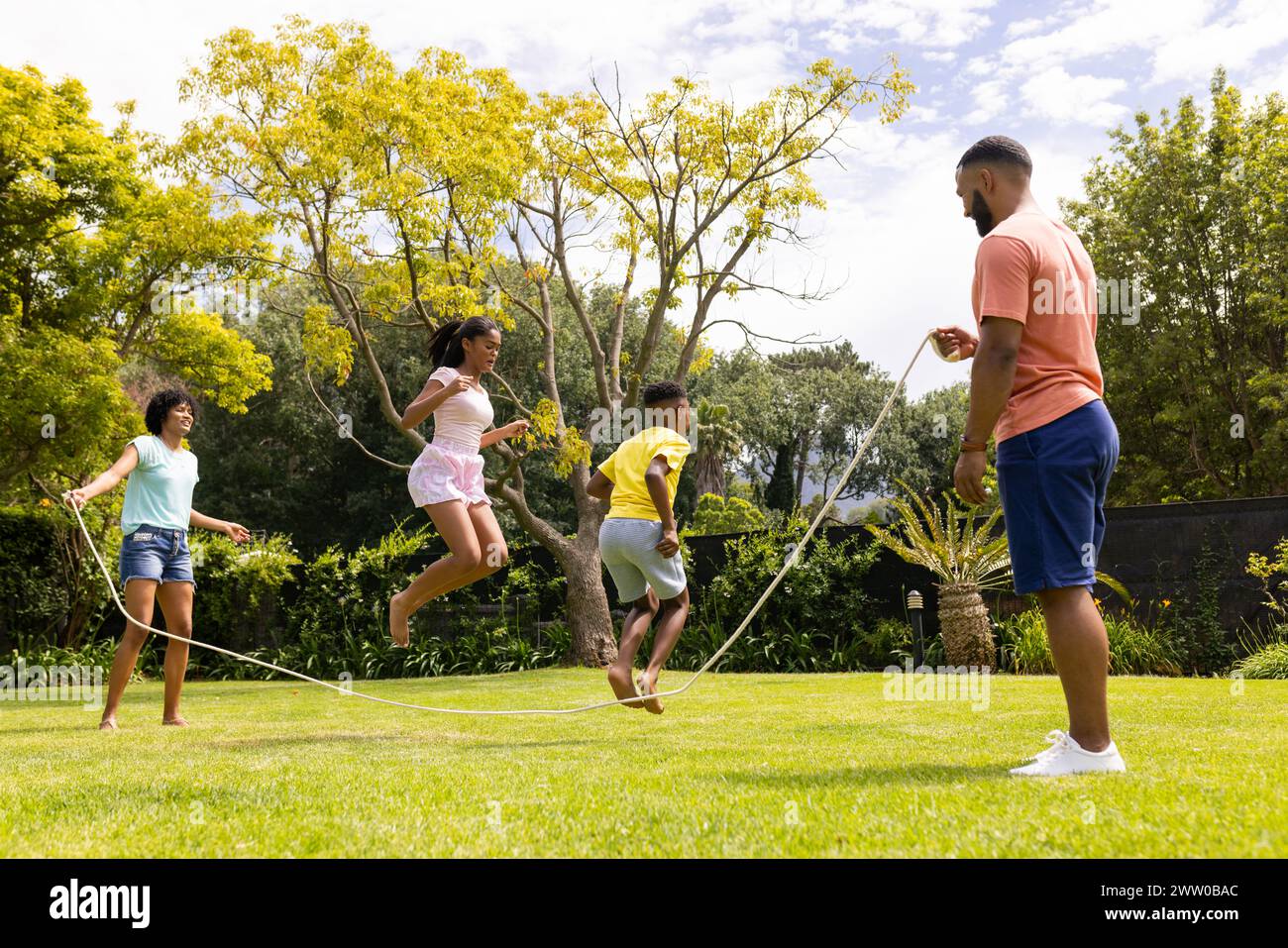 Kids jumping rope hi-res stock photography and images - Alamy