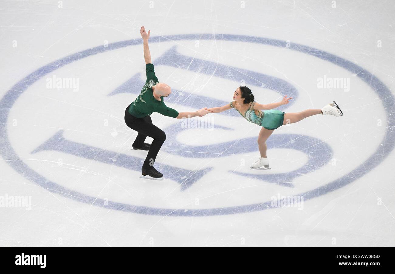 Ellie Kam and Danny O'Shea of the United States perform their pairs ...