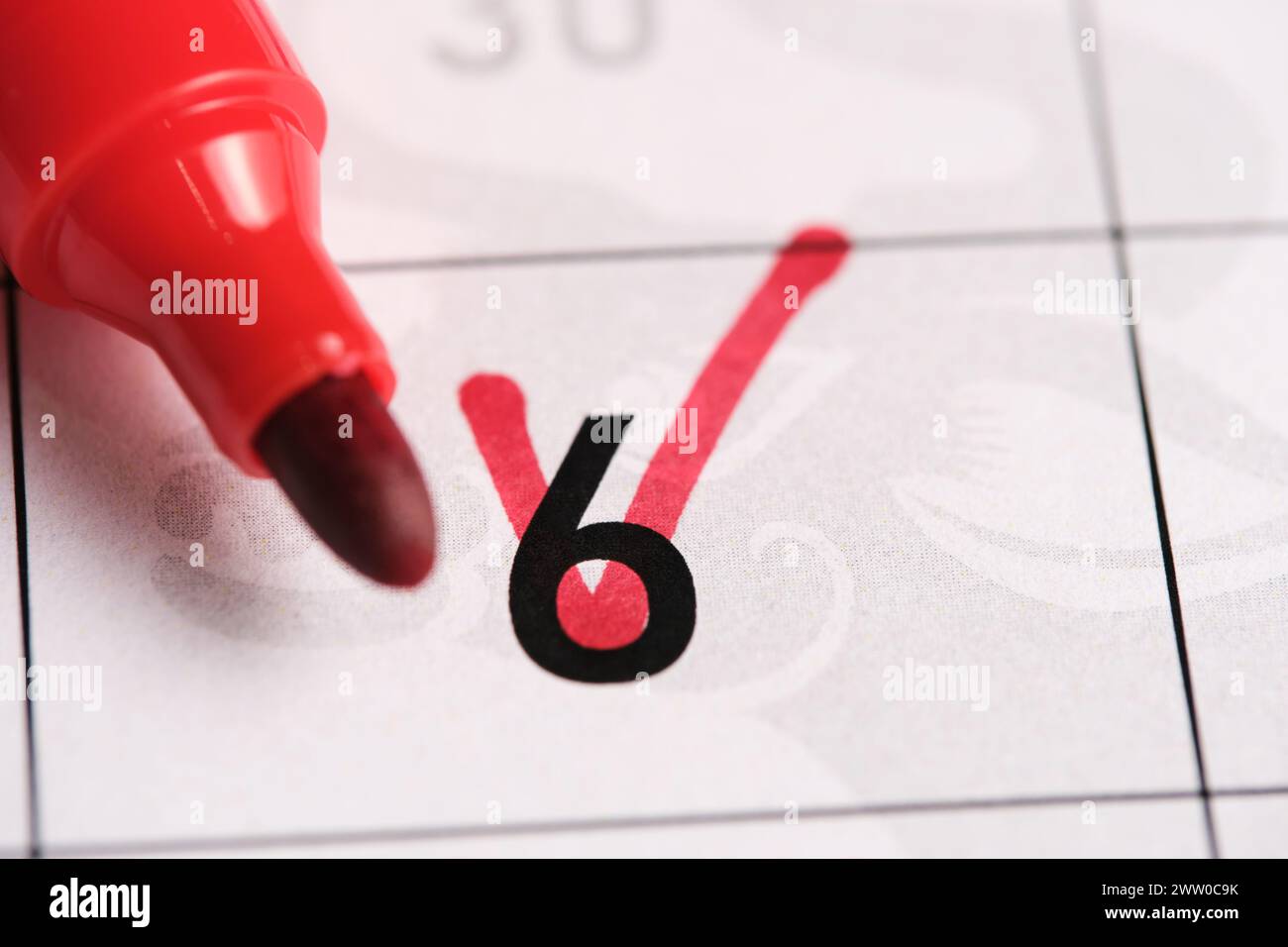 6th day in the calendar is marked with a red marker Stock Photo - Alamy