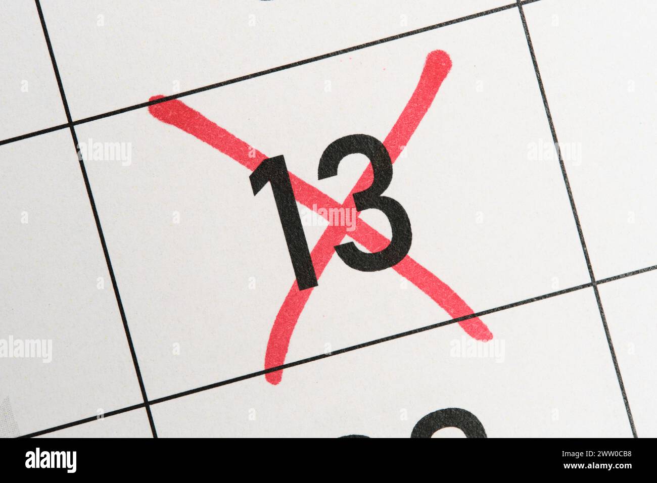 13th number on the calendar is marked in red Stock Photo - Alamy