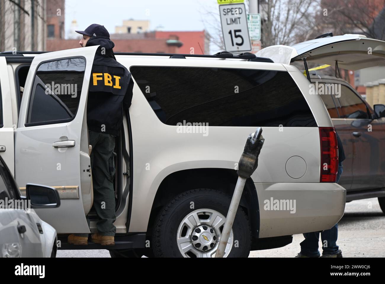 New York, US, 20/03/2024, FBI agents are seen taking various evidence boxes from a warehouse to ...