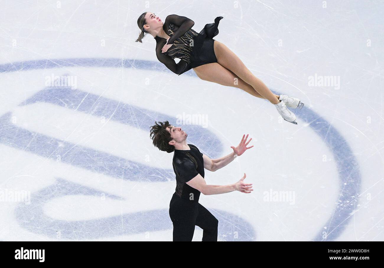 Kelly Ann Laurin and Loucas Ethier, of Canada, perform their pairs ...