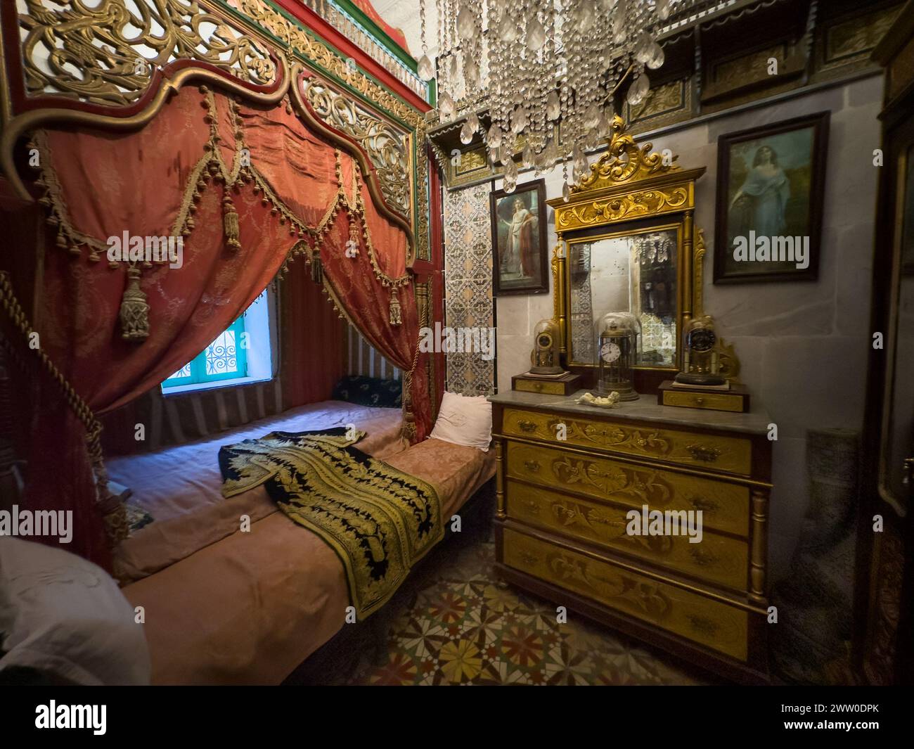 A bedroom and exhibits in the Dar Essid Museum, an 18th century ...