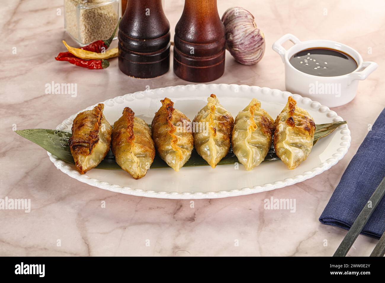 Fried Japanese stuffed dumplings - Gyoza with meat Stock Photo - Alamy