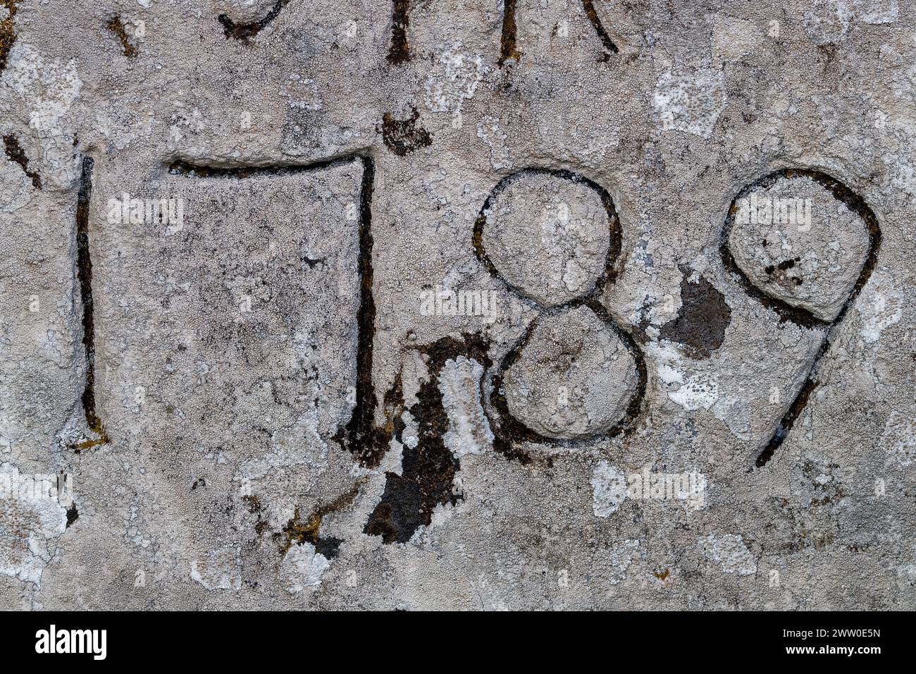 Year 1789 ingraved in stone background Stock Photo - Alamy