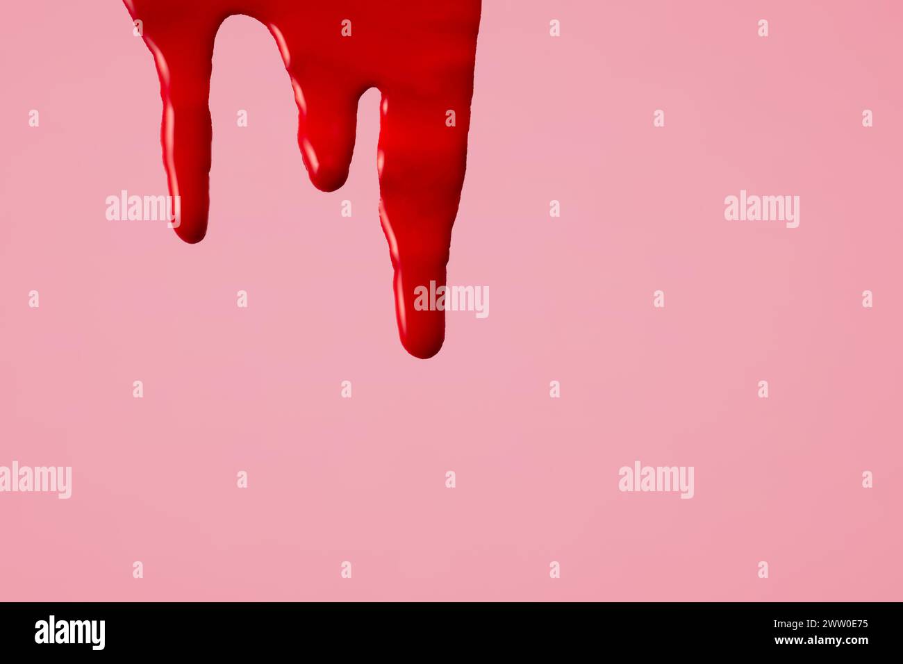 Blood on pink background. First menstrual period concept, menstruation ...