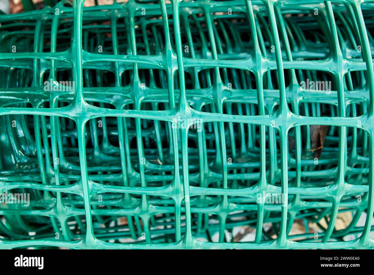 square pattern green plastic flexible garden fence rolled up Stock ...
