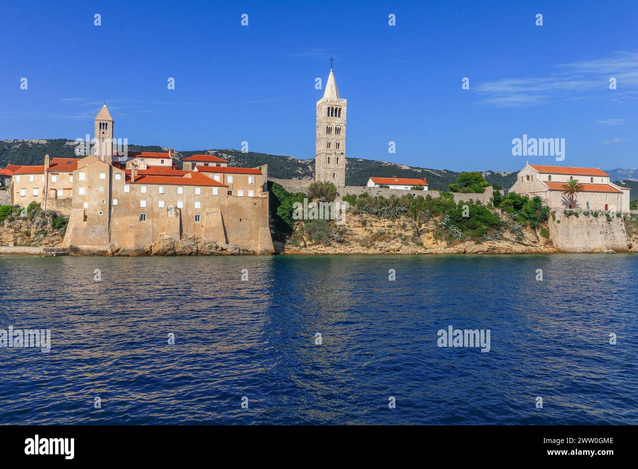 View from the boat over the old town of Rab, historic four church ...