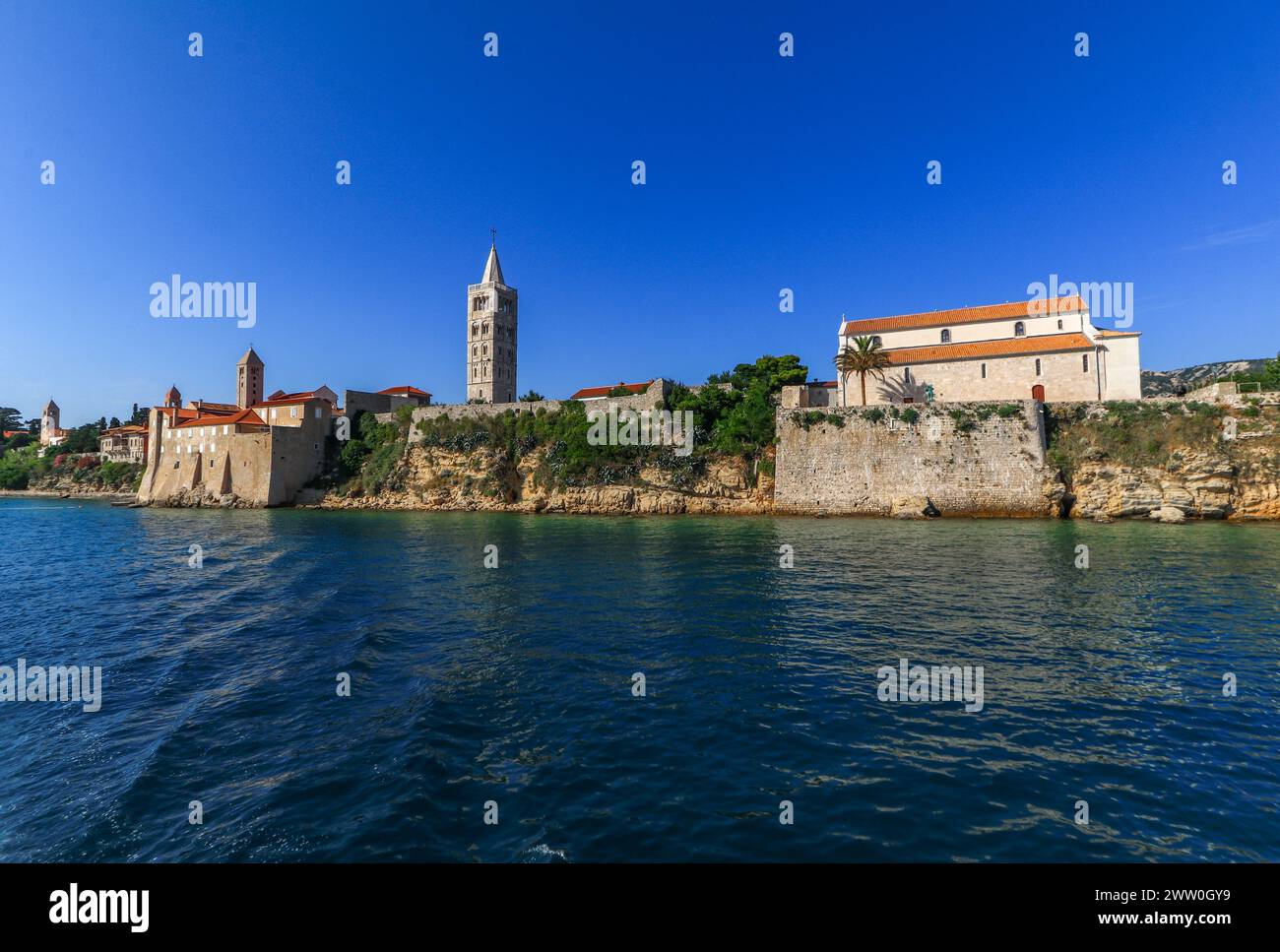 View from the boat over the old town of Rab, historic four church ...