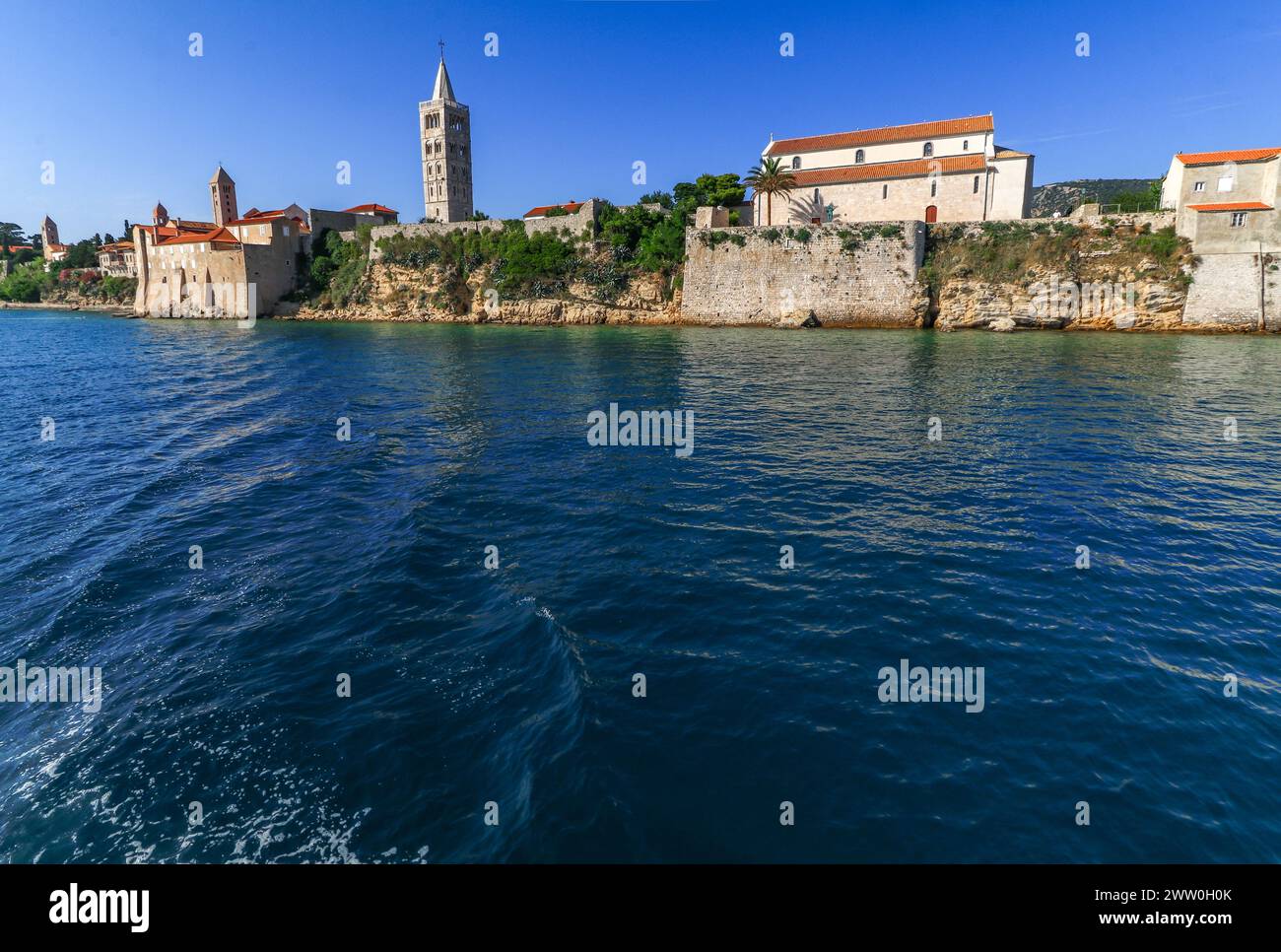 View from the boat over the old town of Rab, historic four church ...