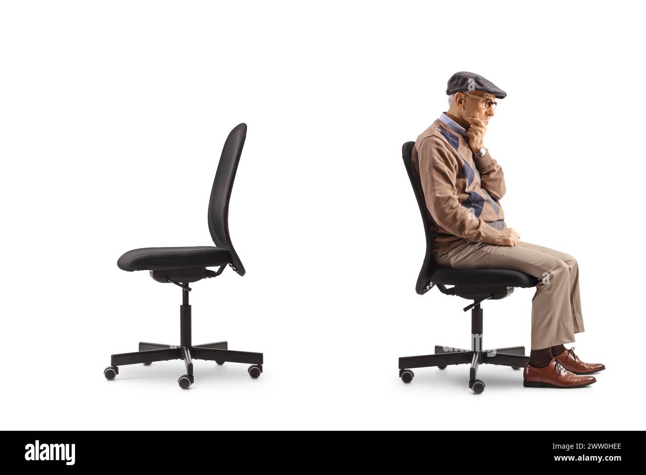 Elderly man sitting on a desk chair and thinking against an empty chair ...