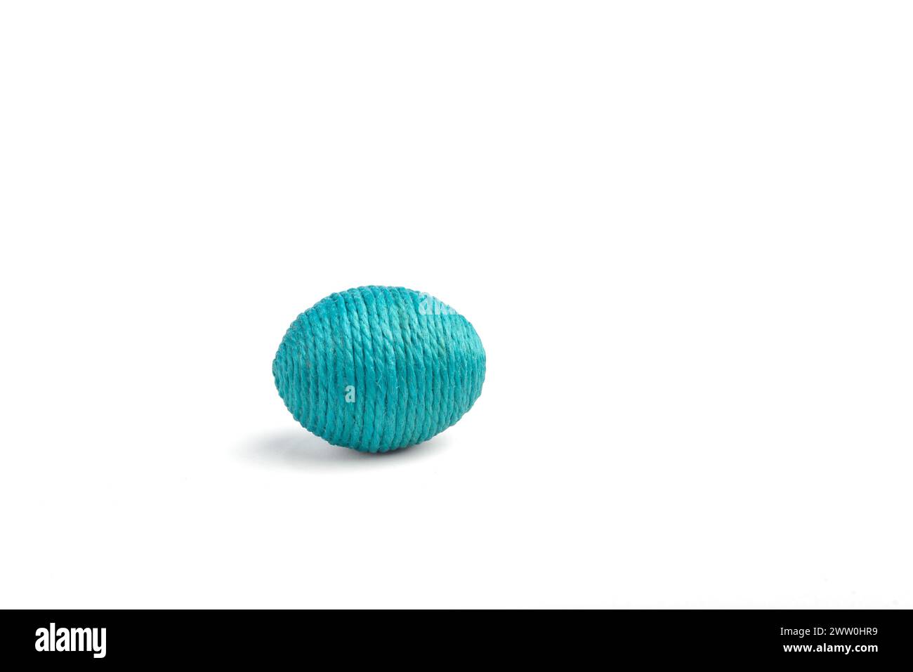 Easter egg made of thread, isolated on white background Stock Photo - Alamy