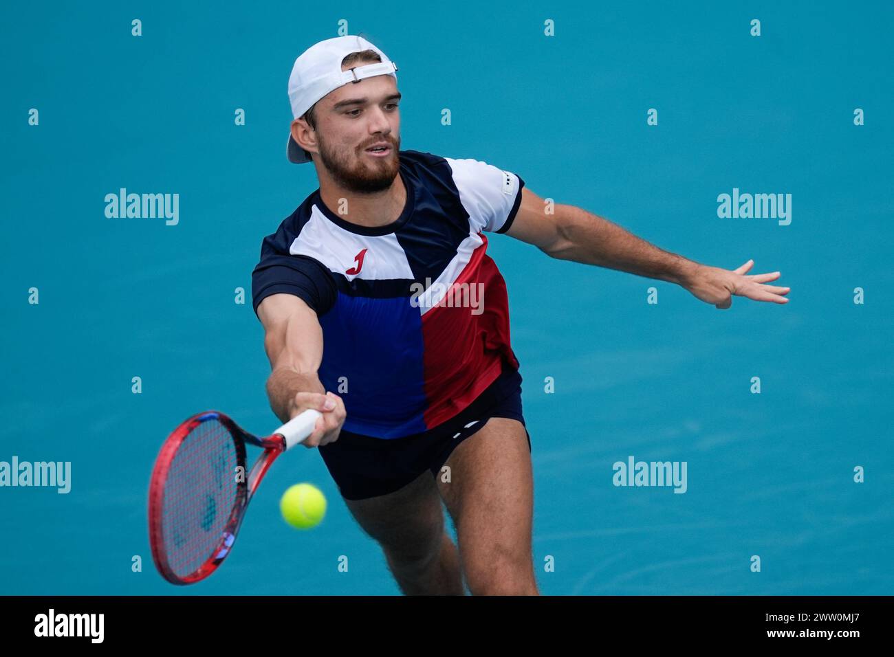 Tomas Machac, of the Czech Republic, returns a ball during a first ...