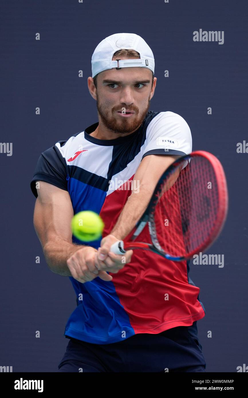 Tomas Machac, of the Czech Republic, returns the ball during a first ...