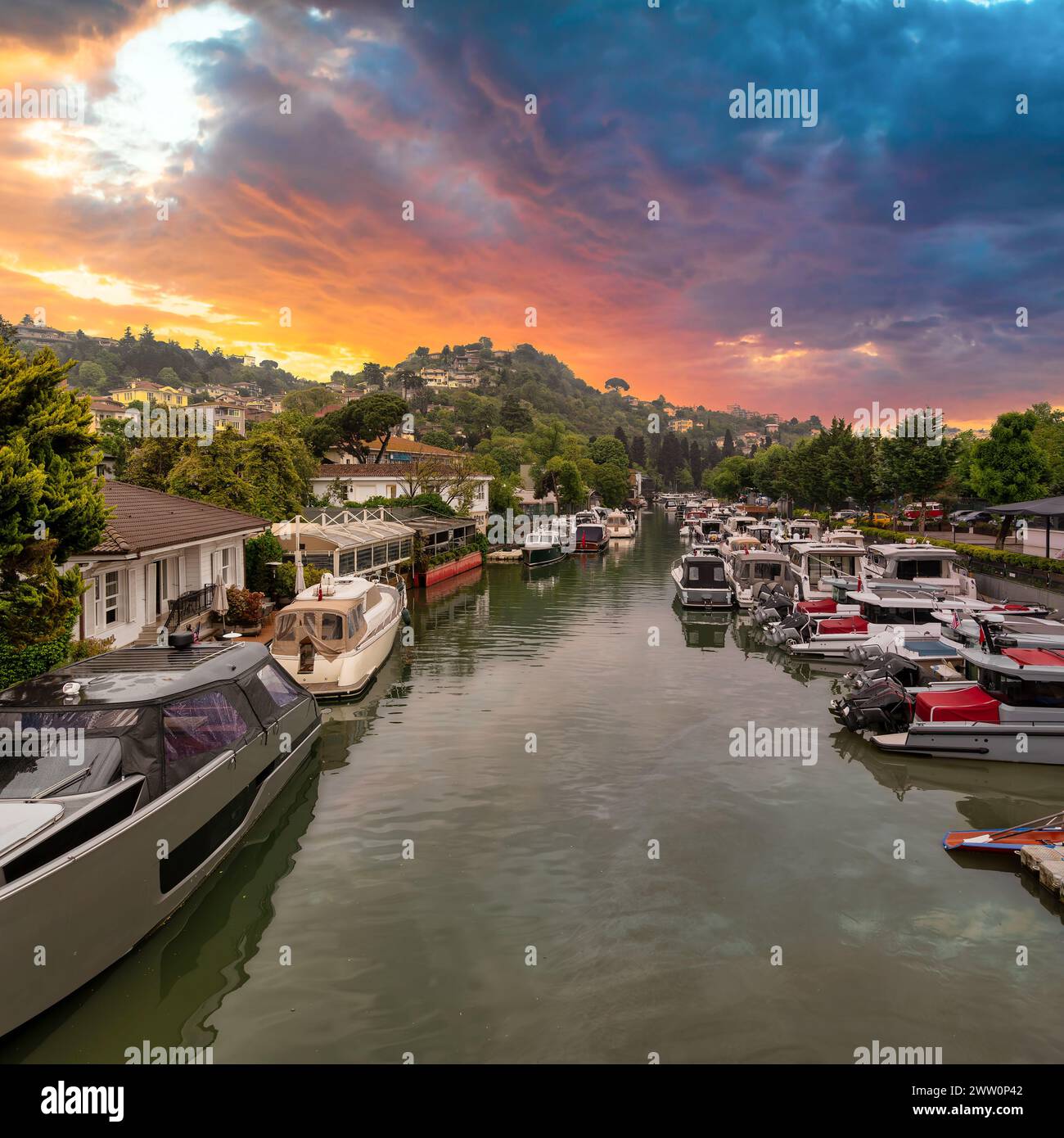 Sunset shot of Goksu Stream, with docked group of different shapes ...