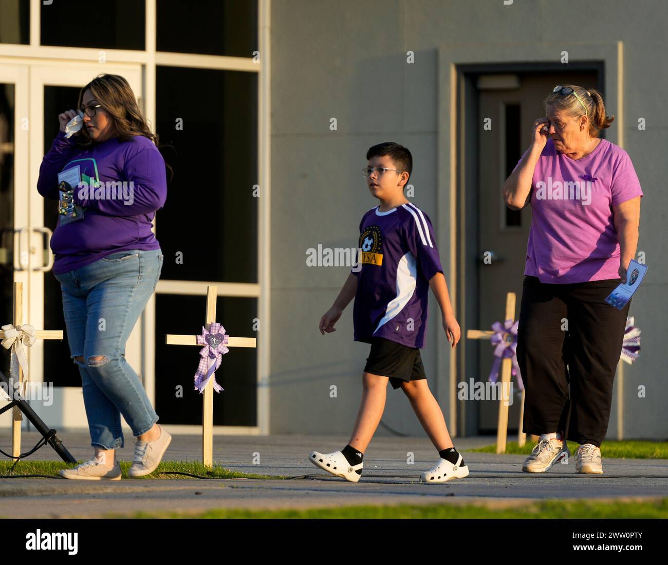 People react after paying their respects to Audrii Cunningham during ...