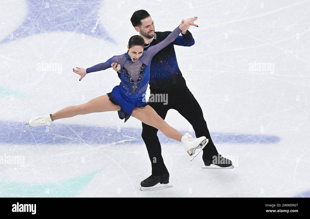 Deanna Stellato-Dudek and Maxime Deschamps, of Canada, perform their ...