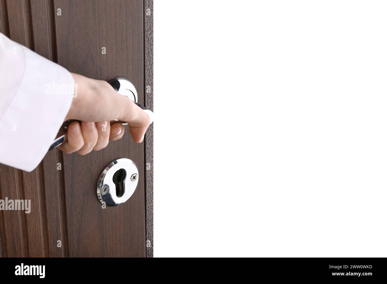 Female hand opening door on white background Stock Photo - Alamy
