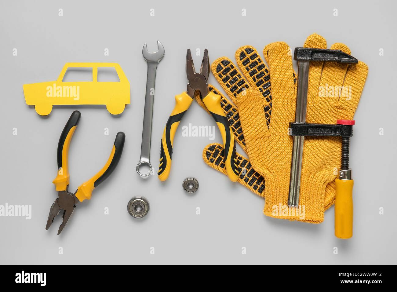 Set of mechanic instruments and paper car on white background. Mechanic ...