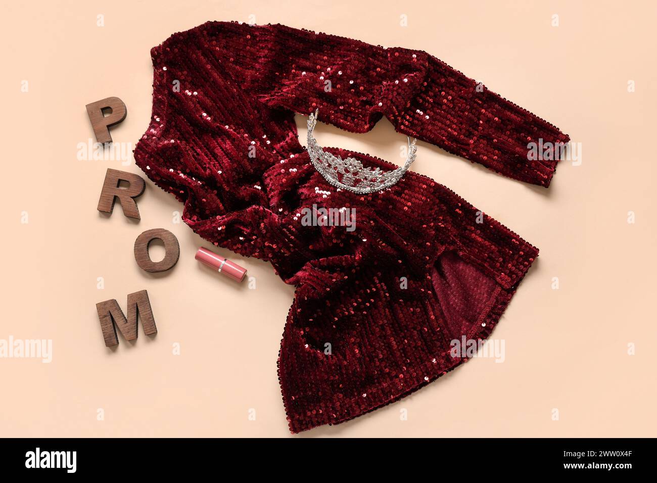 Word PROM with dress, lipstick and tiara on beige background Stock ...