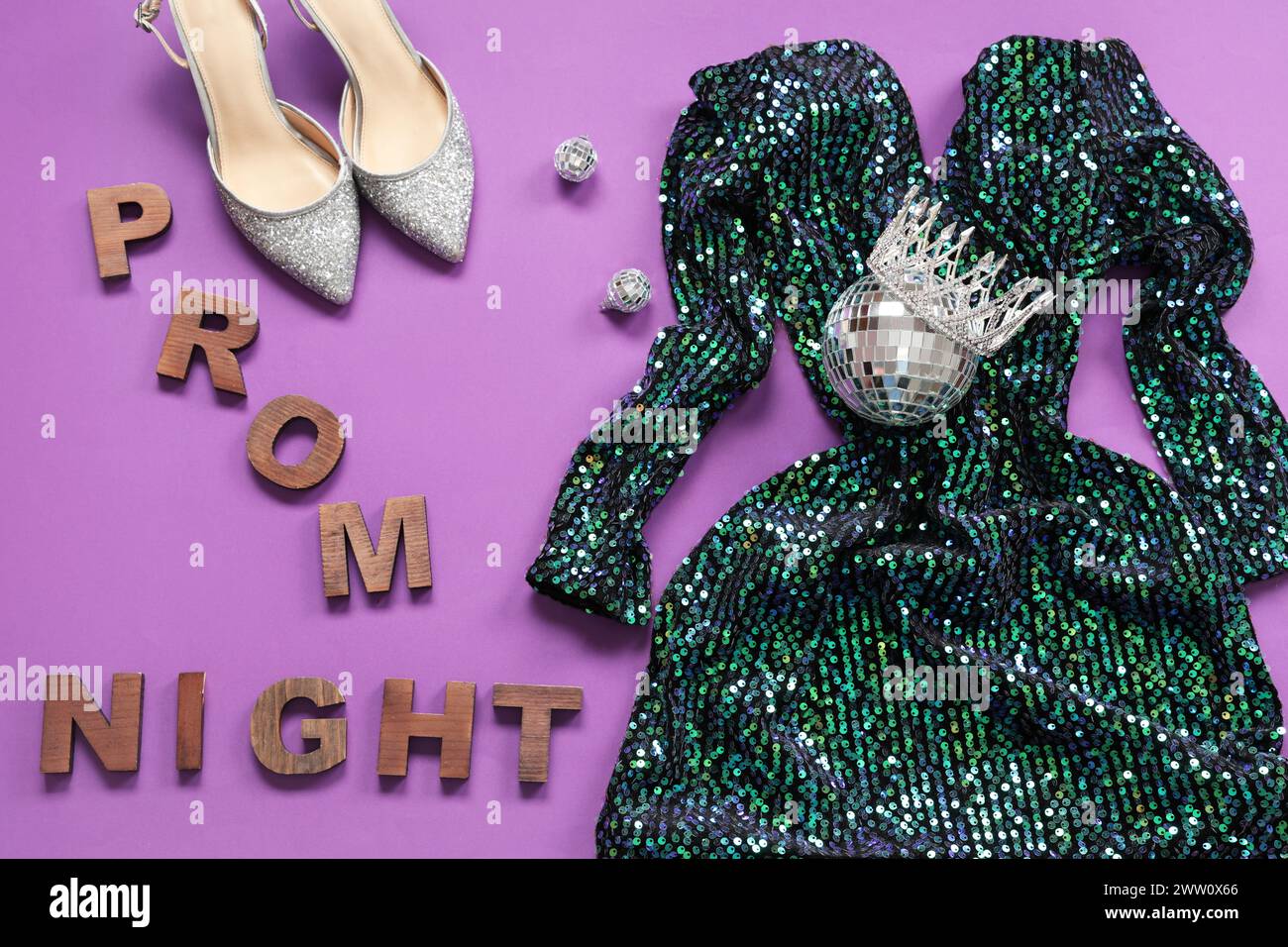 Text PROM NIGHT with dress, shoes and disco ball on purple background ...