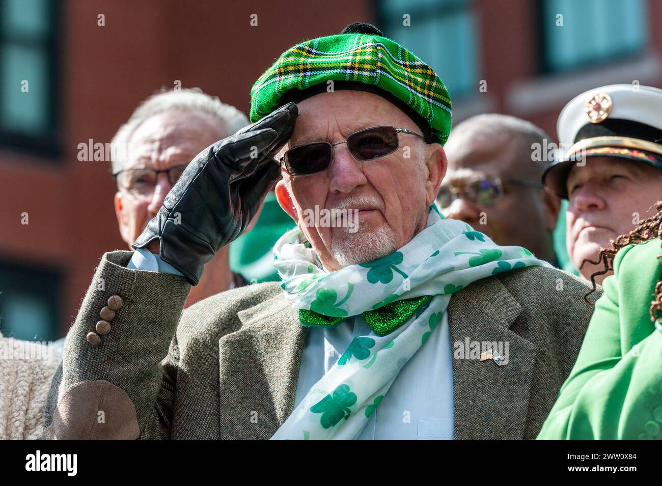 Parade Chief Marshall Jerry Wheeler saluting during the singing of the ...