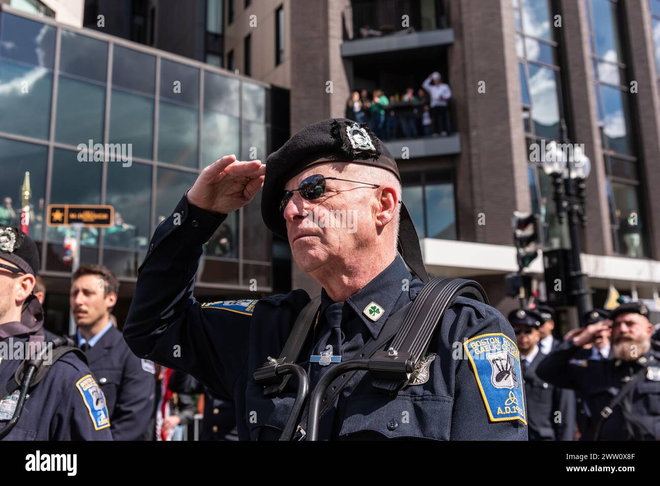 Officer with the Boston Police Gaelic Column saluting during the ...