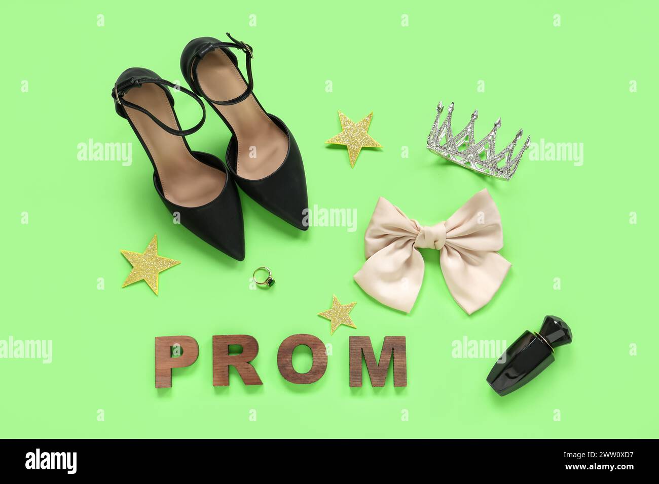 Word PROM with female shoes, crown and perfume bottle on green ...