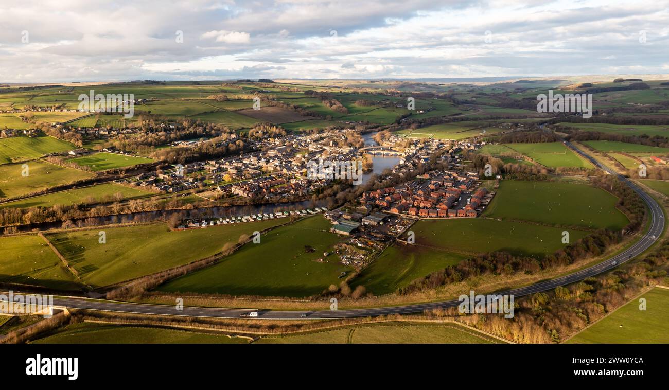 An aerial panoramic landscape of the village of Haydon Bridge in the ...