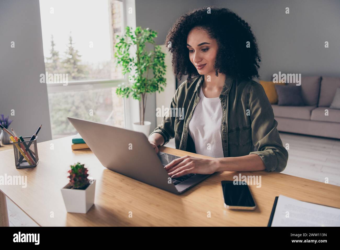 Photo of busy pretty lady freelancer dressed shirt coding modern gadget ...
