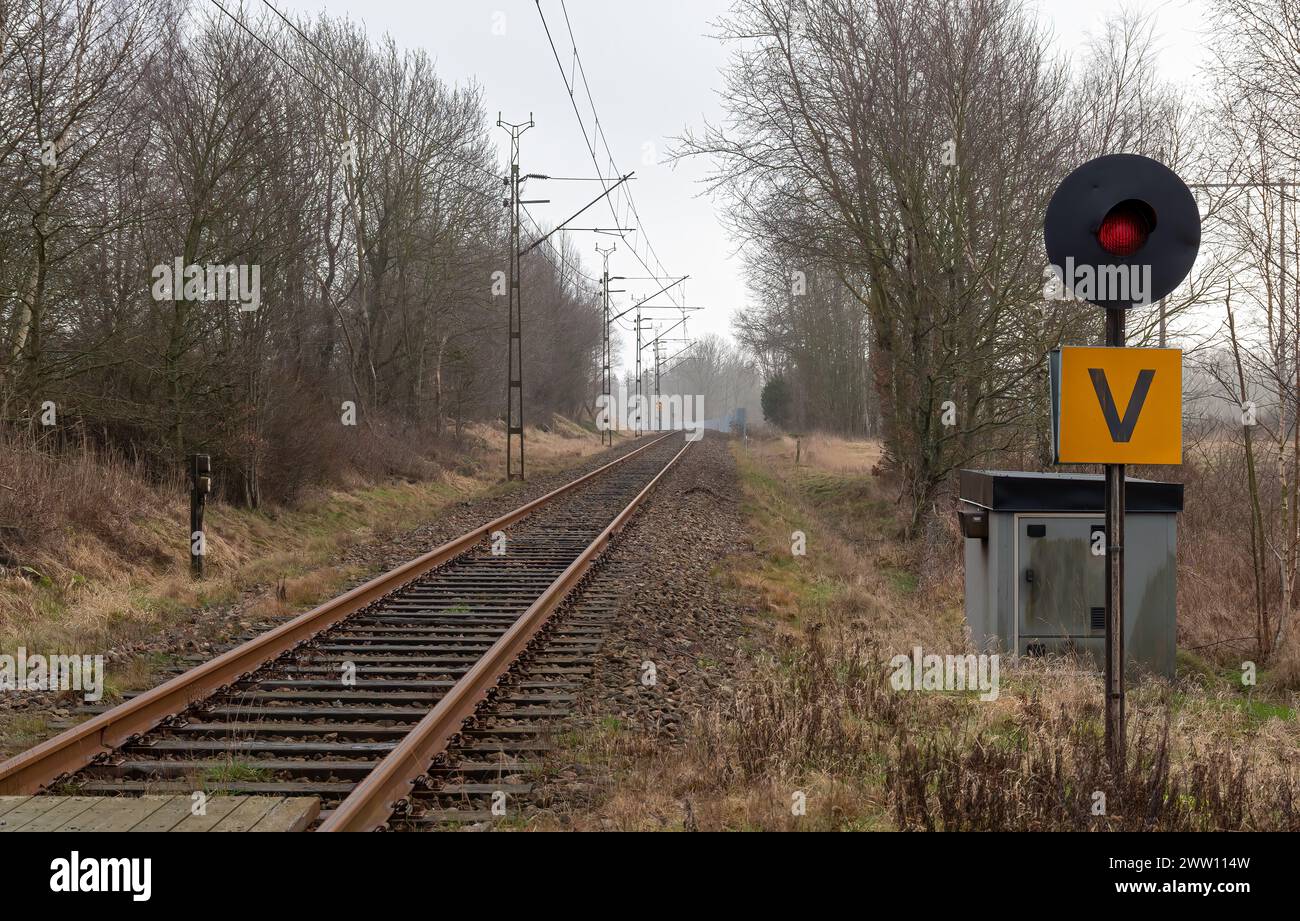 Railway track with signal and sign Stock Photo - Alamy