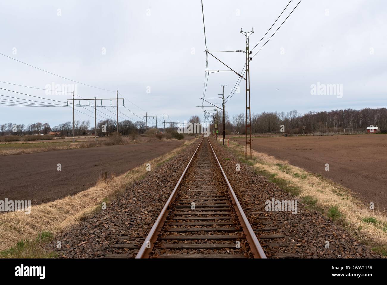 Straight railway track Stock Photo - Alamy