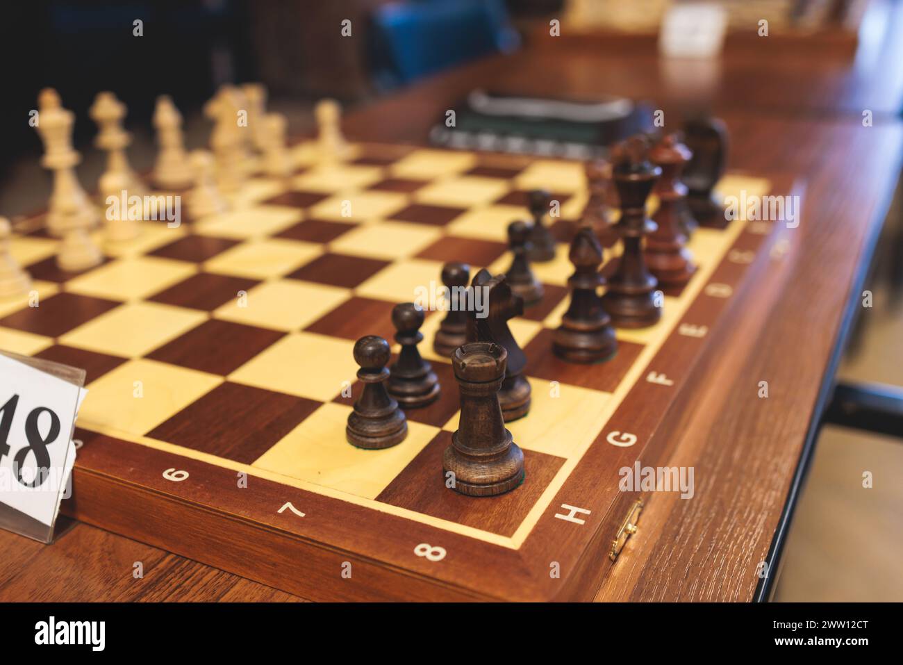 Chess tournament, kids and adults participate in chess match game ...